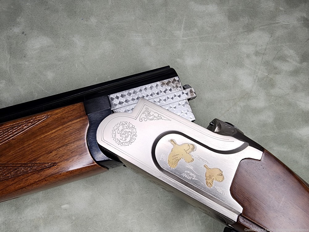 Mossberg International Engraved Silver Reserve OU 28GA Penny Auction ...