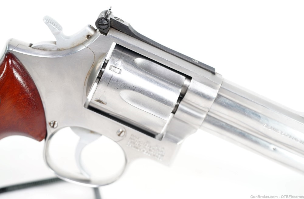 S&W 686 4" .357 mag SS with wood grips - Revolvers at GunBroker.com ...