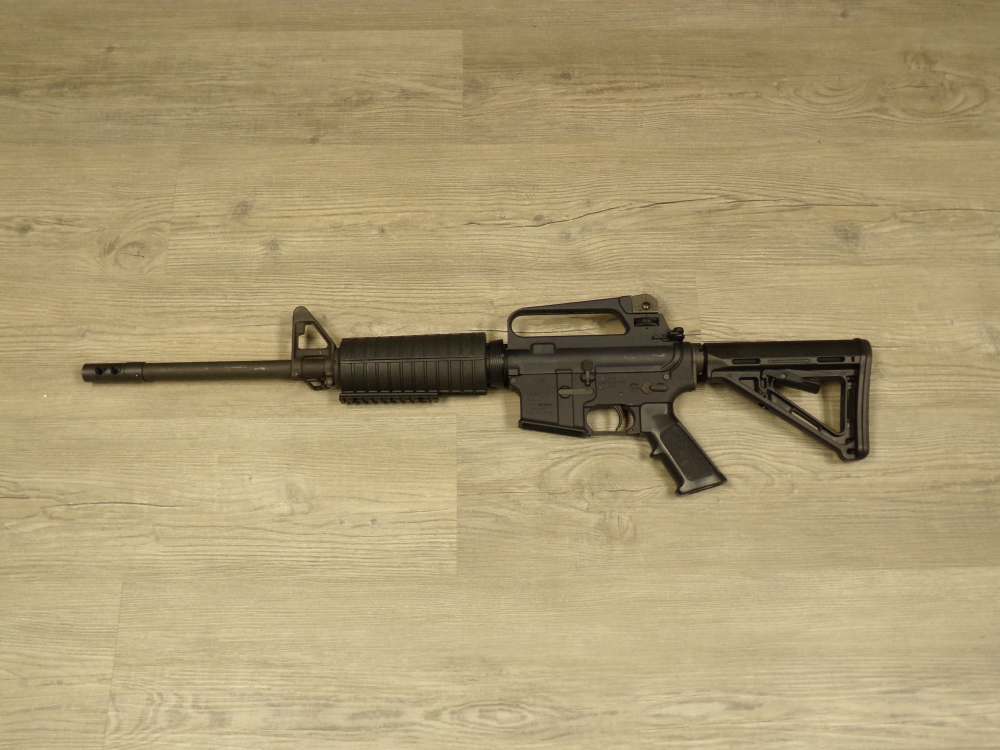 Bushmaster XM15-E2S 16 inch Heavy Barrel A2 5.56 Rifle w/Fixed handle ...