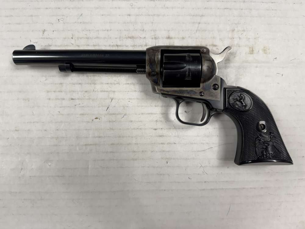 Colt, Peacemaker .22 Magnum Blued Black Handle - Revolvers at GunBroker ...
