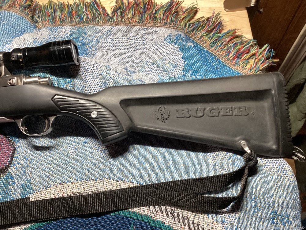 1992 M77 MARK II 7mm Remington MAG with 3x9 wide-field Redfield optic ...