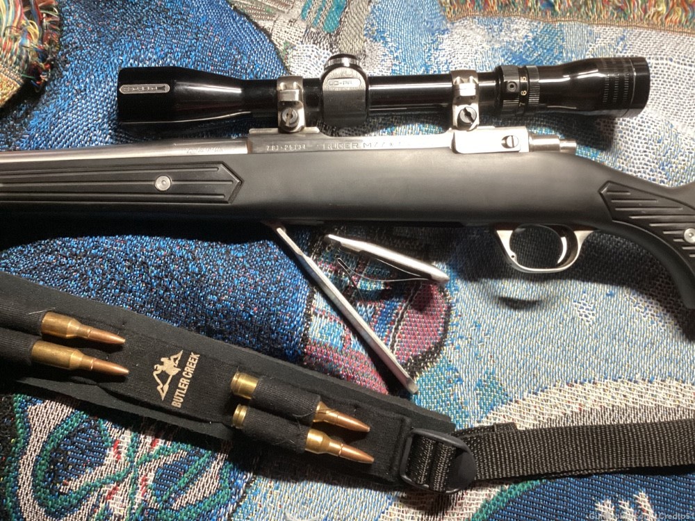 1992 M77 MARK II 7mm Remington MAG with 3x9 wide-field Redfield optic ...