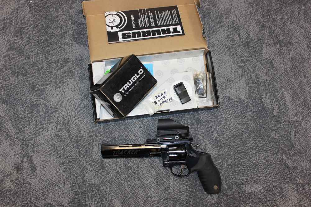 Discontinued Taurus Tracker M990 9-shot .22LR 6.5" revolver w/Extras! - Revolvers at GunBroker ...
