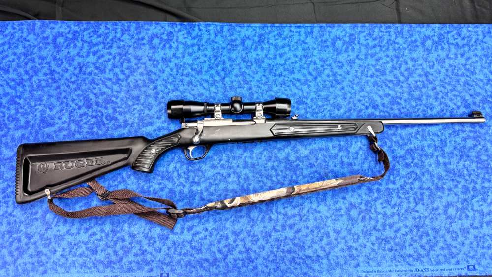 Ruger 77/22 .22LR All Weather Stainless w/ Swift Scope Boat Skeleton ...